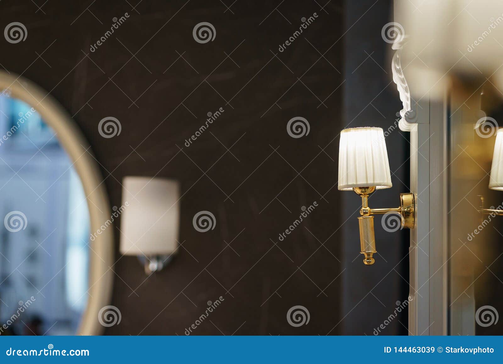 Several Elegant Stylish And Simple Lamps Sconces On The Wall In The Room Stock Image Image