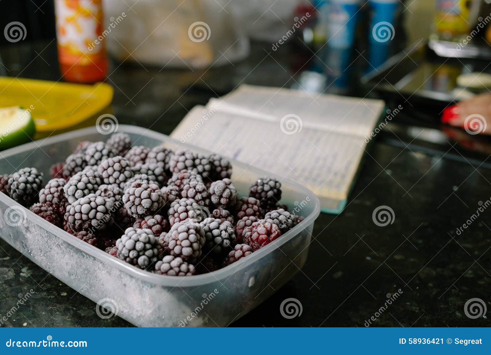 Several Frozen Blackberries in Plastic Box on Kitchen Stock Image ...