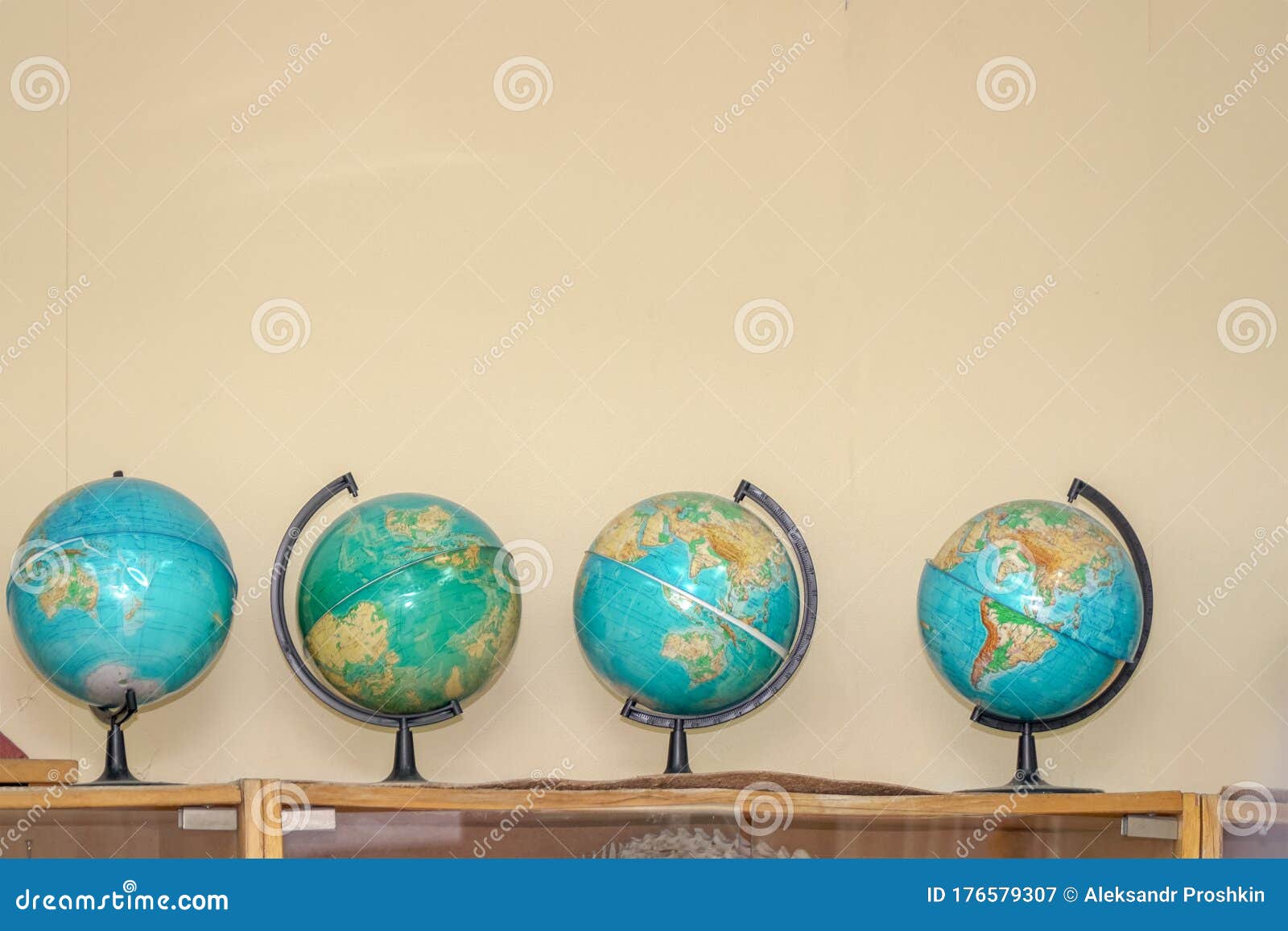 Several Geographical Globes on a Shelf Stock Image - Image of continent ...