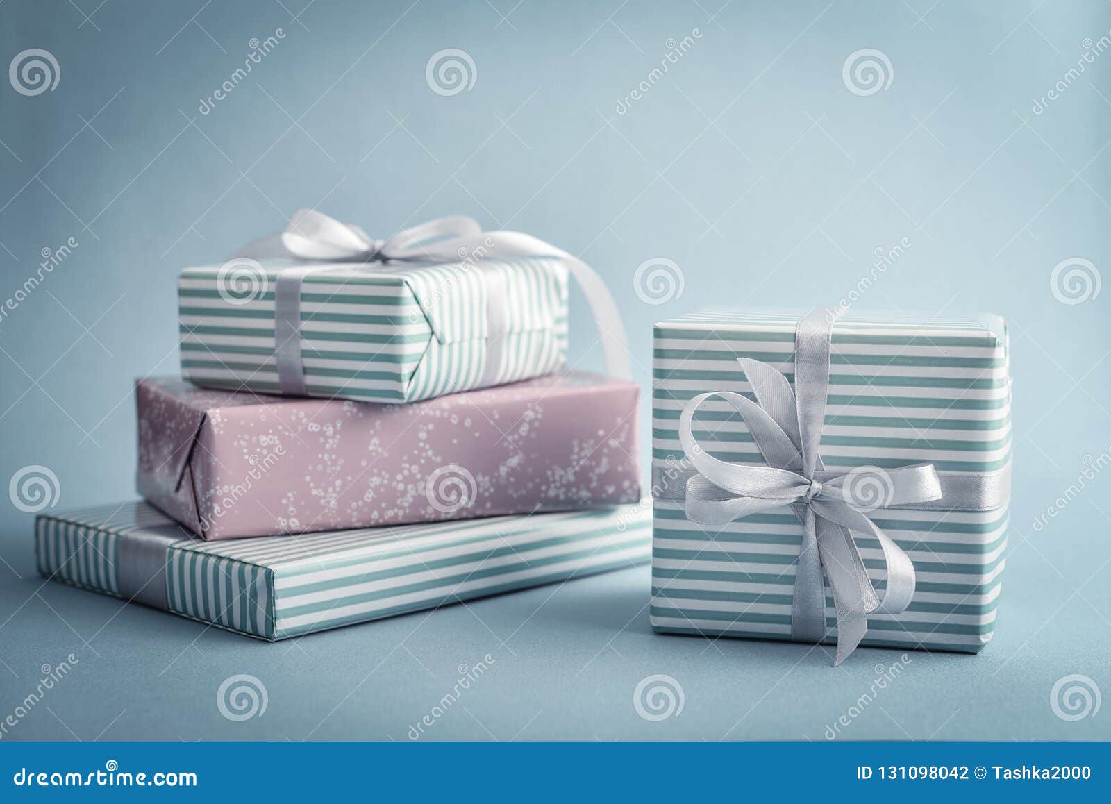 Several Gift Striped Boxes with Grey Ribbon Stock Photo - Image of ...