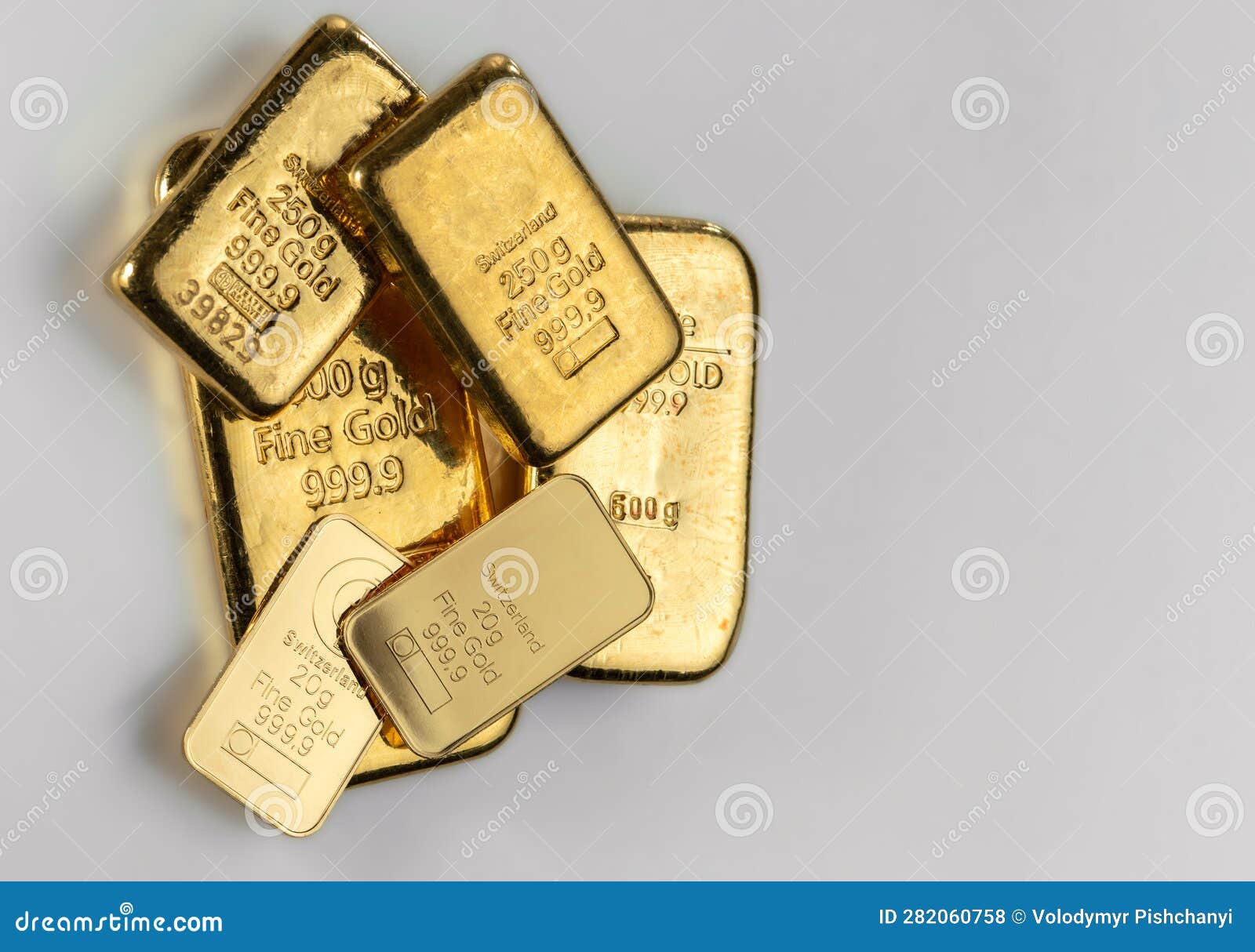 Several Gold Bars of Different Weights on a Gray Stock Photo - Image of ...