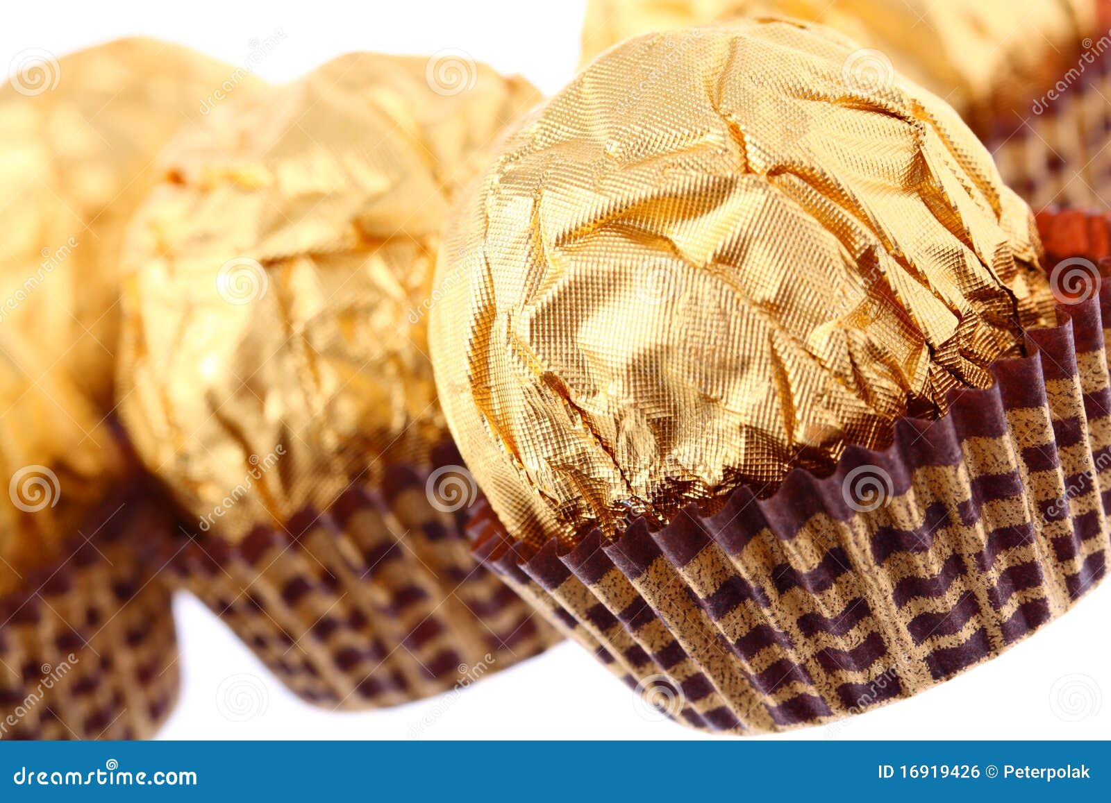Several Golden Luxury Sweets Isolated on White Stock Photo - Image of ...