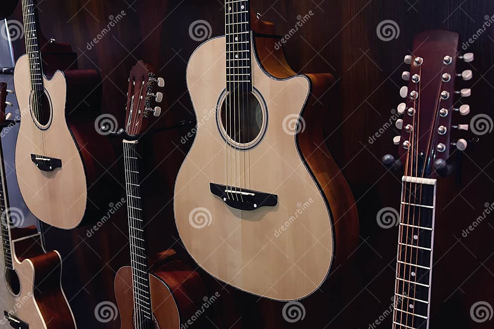 Several Guitars in a Musical Instrument Store Stock Photo - Image of ...