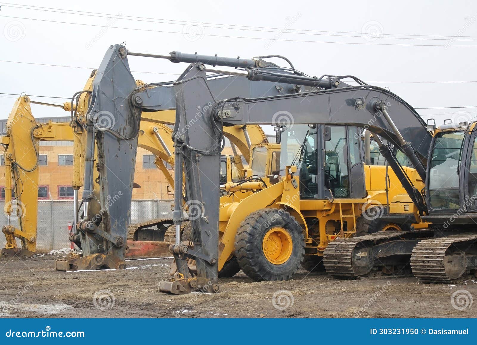 Several Heavy Construction Vehicles, Including Excavators, Diggers ...