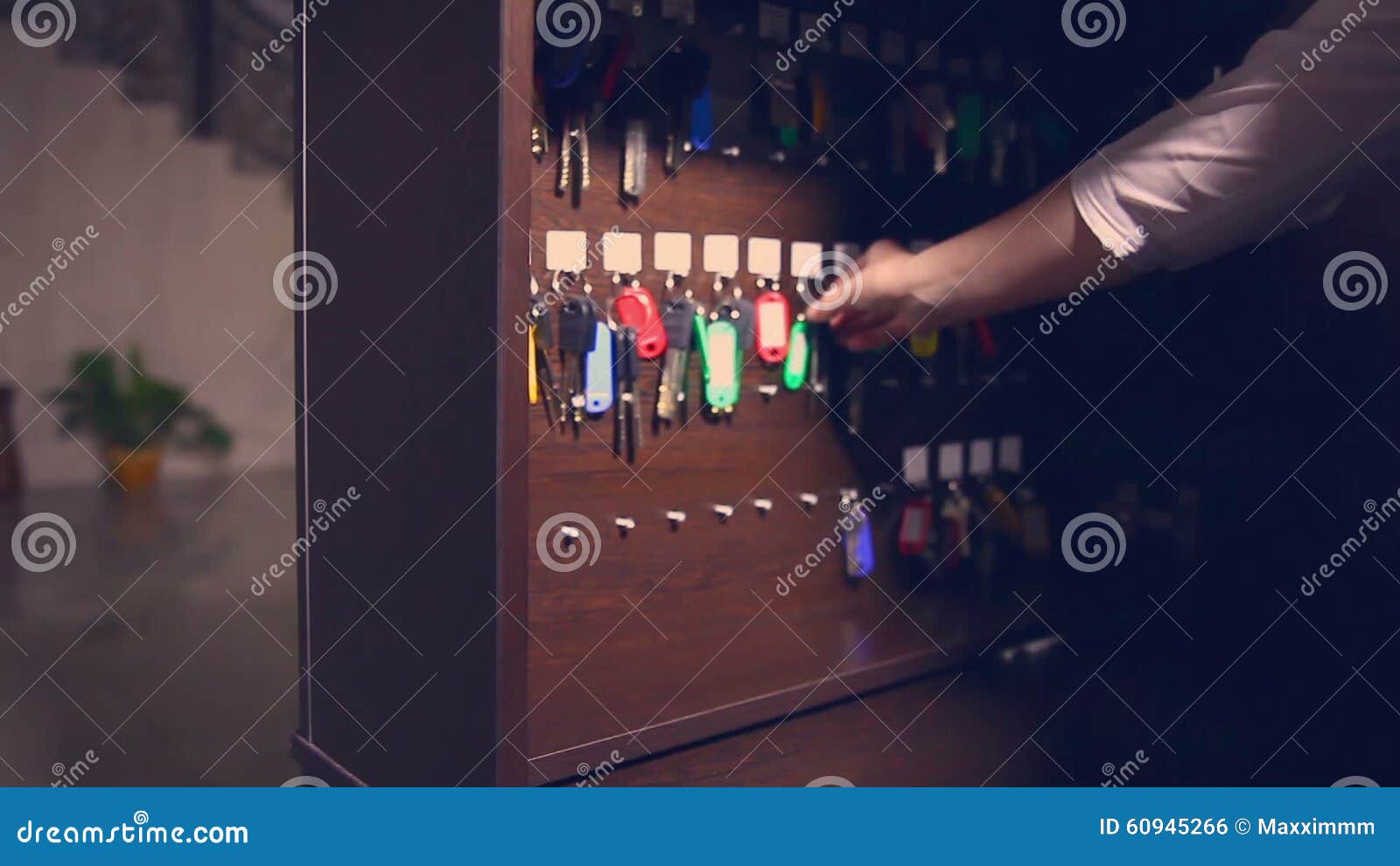 Several Hotel Keys on Wooden Board Girl Reception Stock Footage - Video ...
