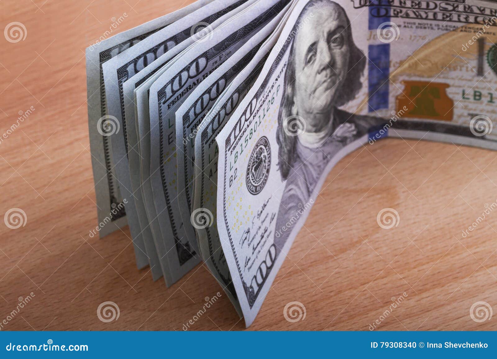 Several Hundred-dollar Bills on the Table Stock Photo - Image of ...