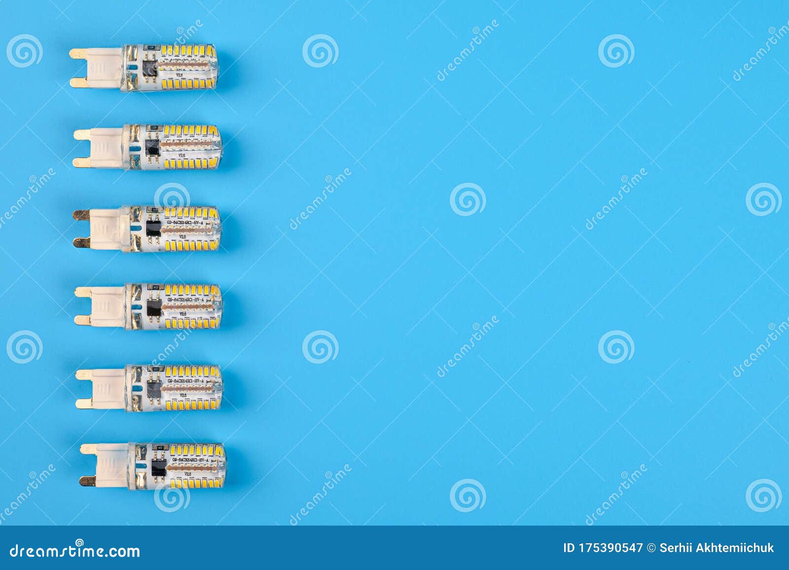 Several LED Bulb on Blue Background. Saving Energy Concept. Ftat Lay ...