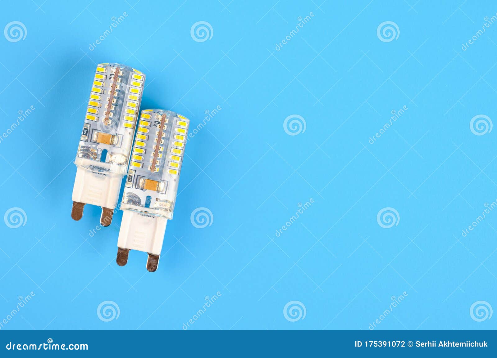 Several LED Bulb on Blue Background. Saving Energy Concept. Ftat Lay ...