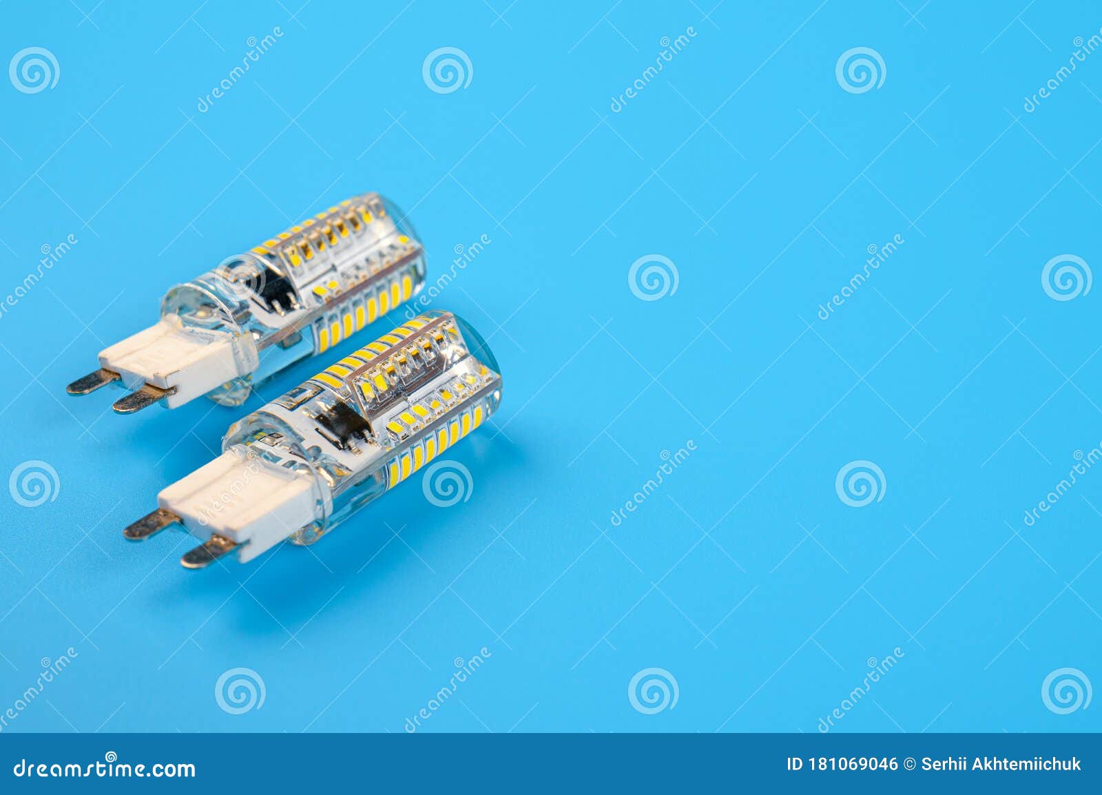 Several LED Bulb on Blue Background. Saving Energy Concept. Ftat Lay ...