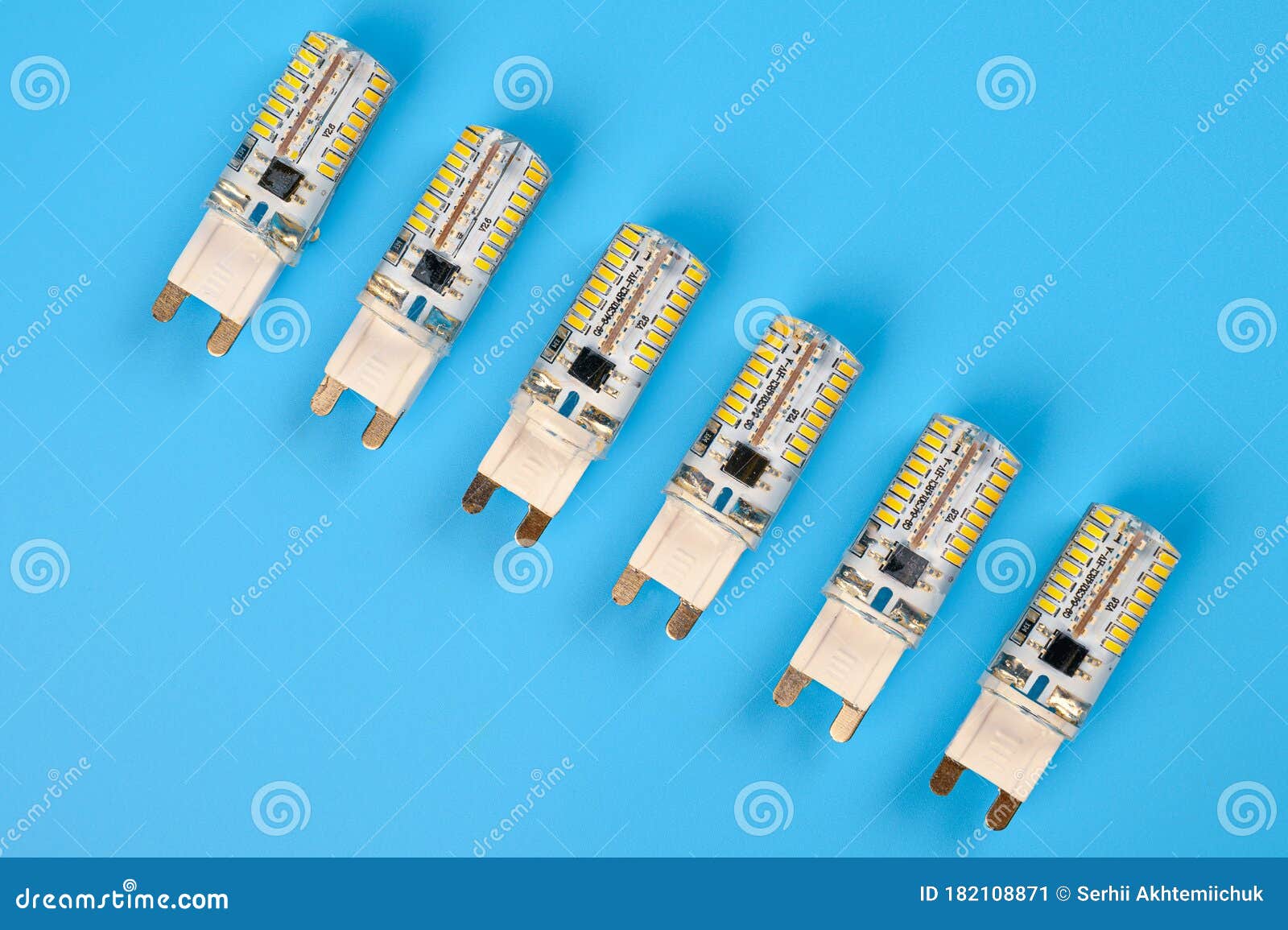 Several LED Bulb on Blue Background. Saving Energy Concept. Ftat Lay ...