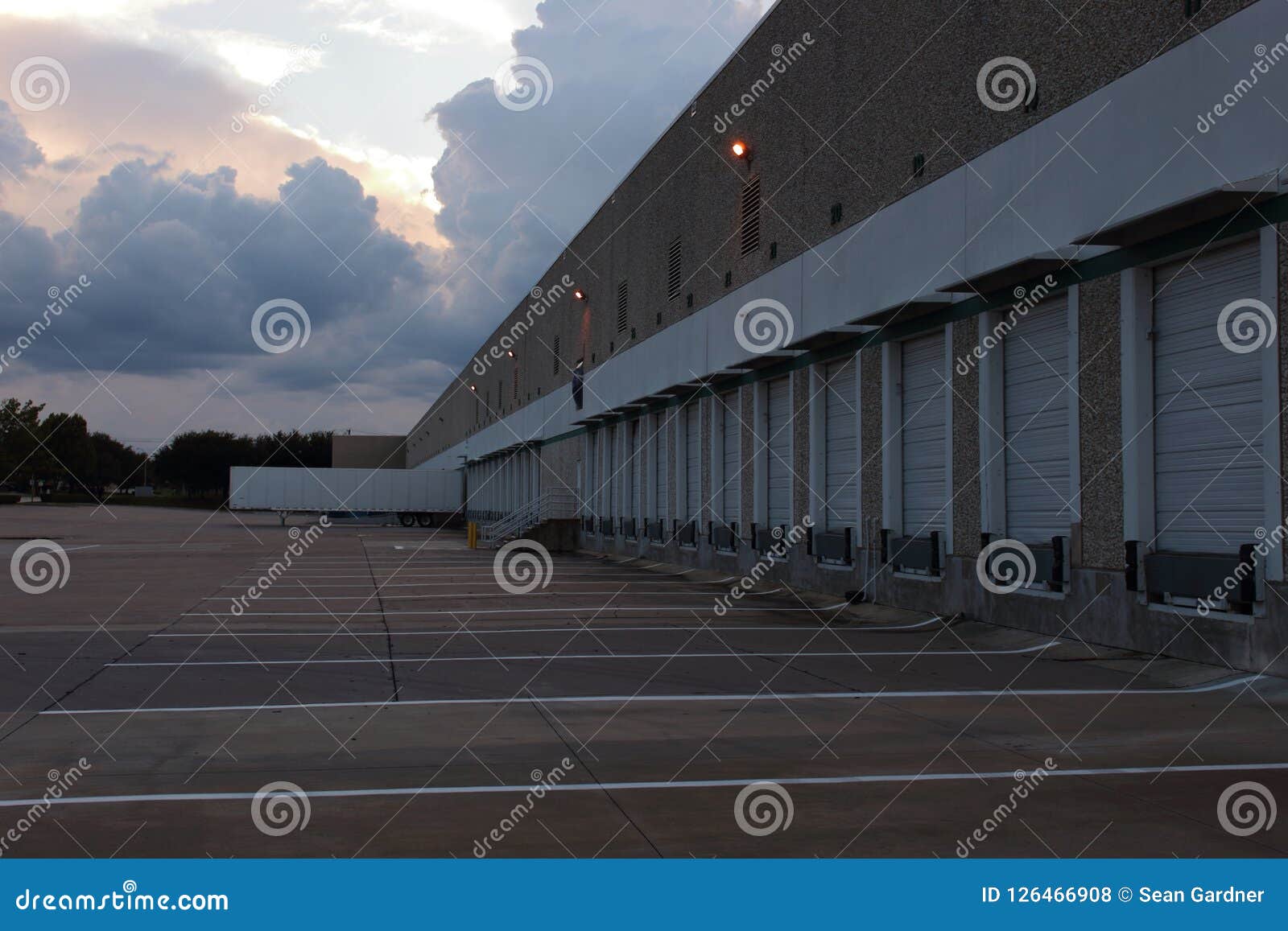 Evening at the Warehouse Loading Dock Stock Photo - Image of work ...