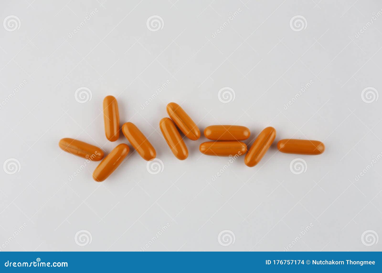 Several Long Orange Colored Tablets. Stock Photo - Image of banded ...