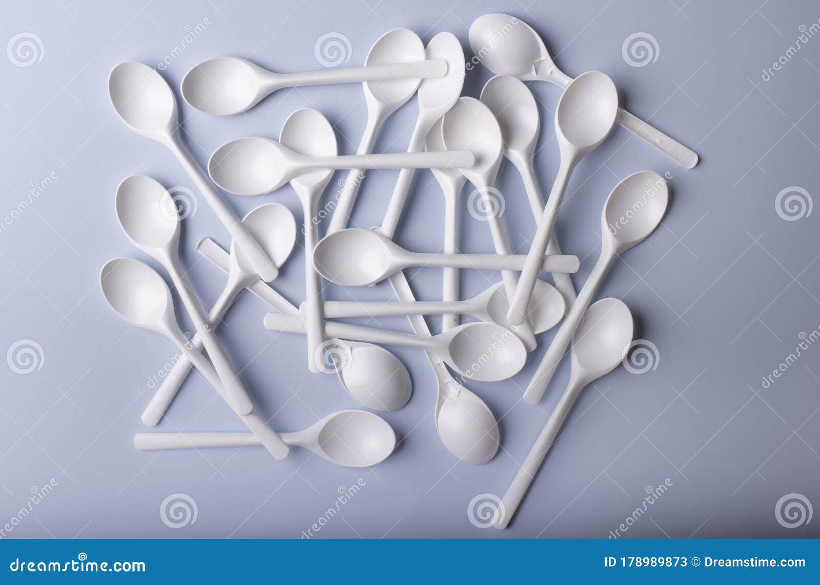 Several Messy Spoons on a Blue Background Stock Image - Image of single ...