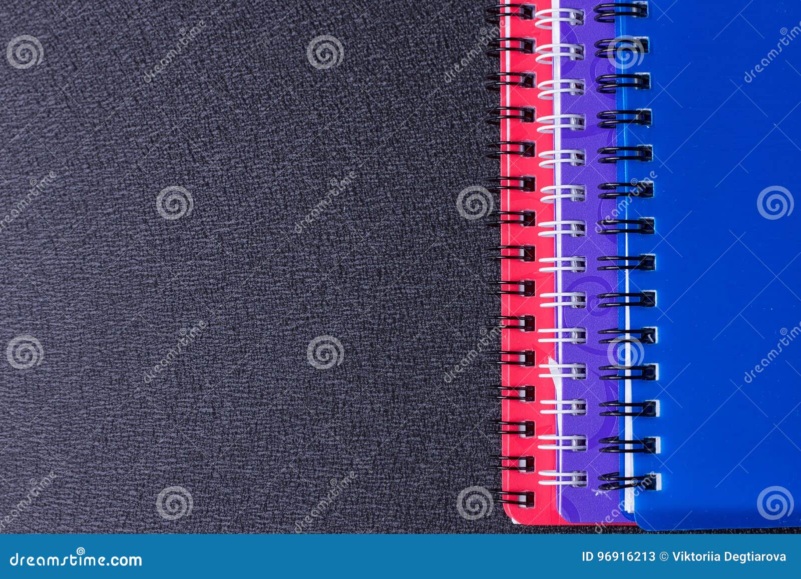 Several Multi-colored Notebooks on a Spiral Stock Image - Image of ...