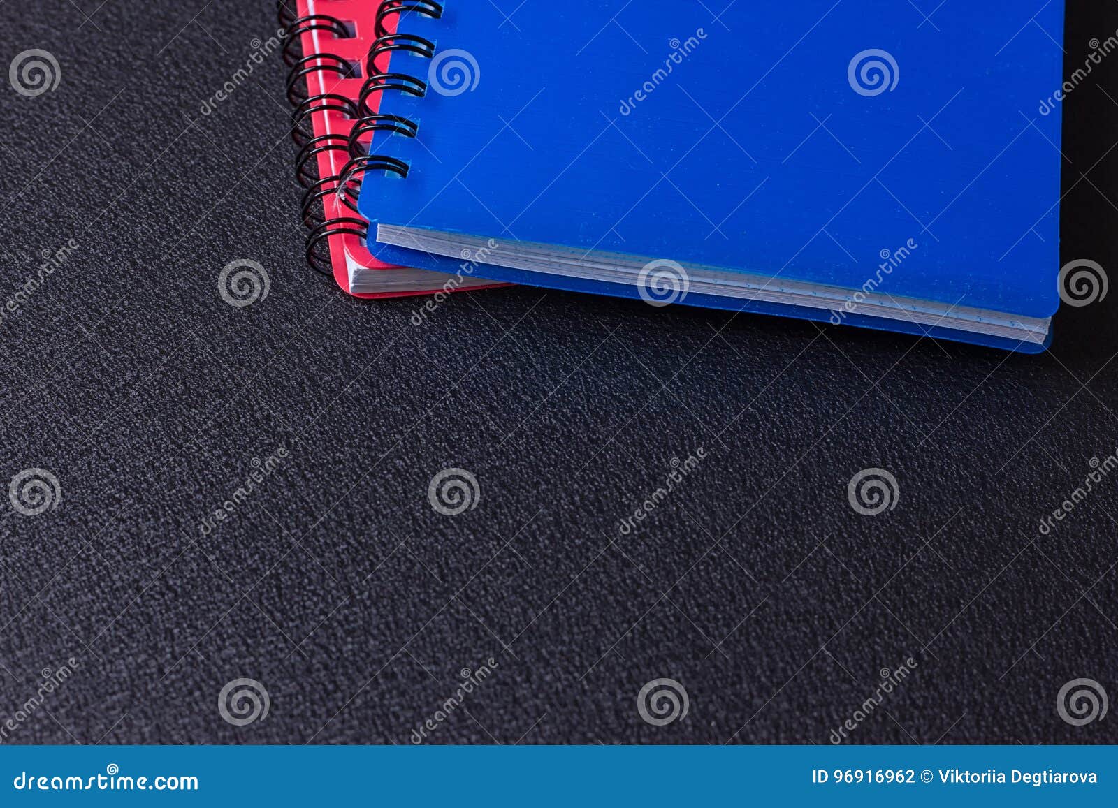 Several Multi-colored Notebooks on a Spiral Stock Photo - Image of ...