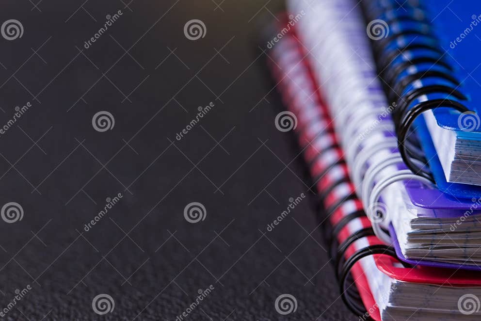 Several Multi-colored Notebooks on a Spiral Stock Image - Image of ...