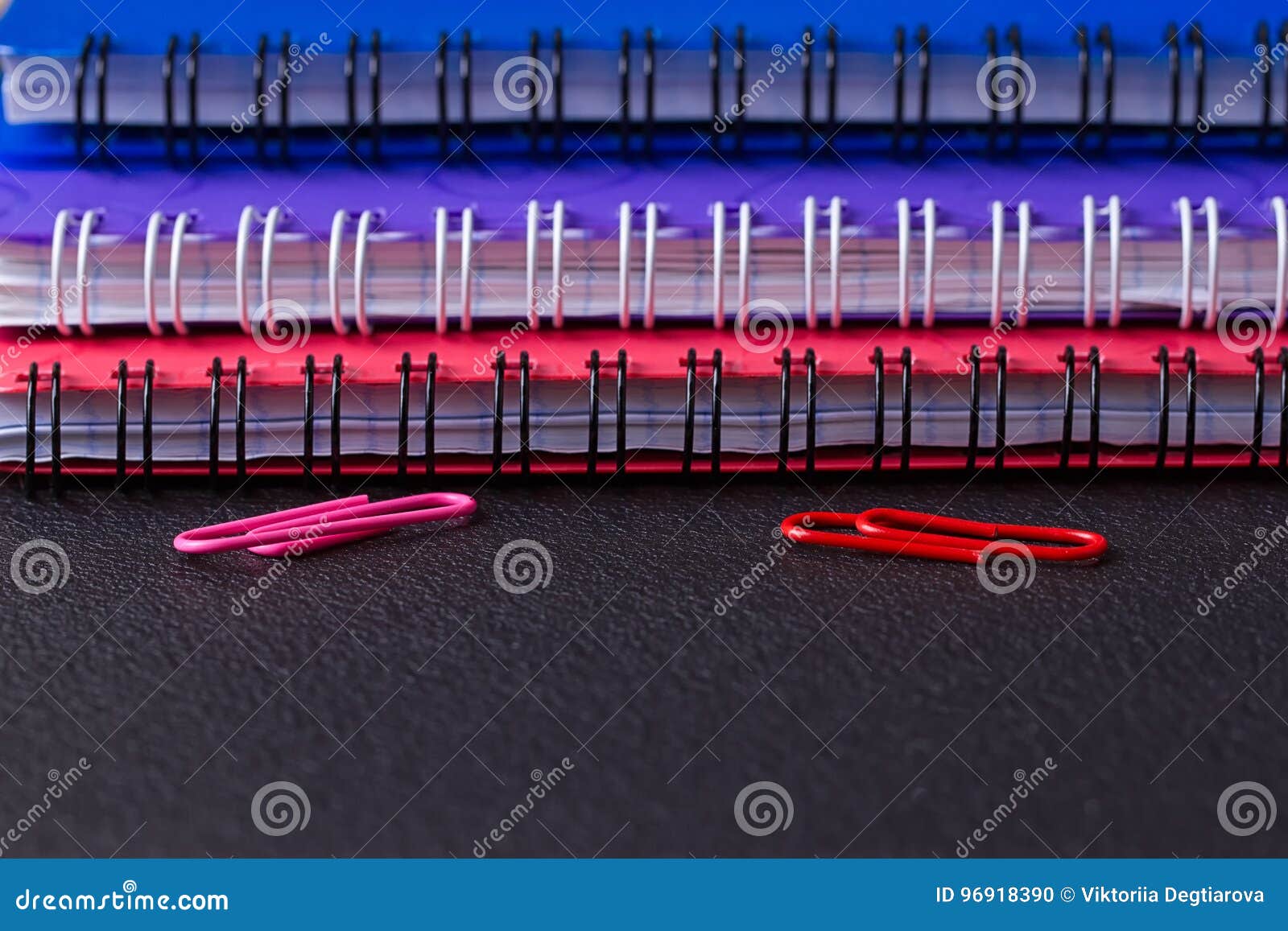 Several Multi-colored Notebooks on a Spiral Stock Photo - Image of ...