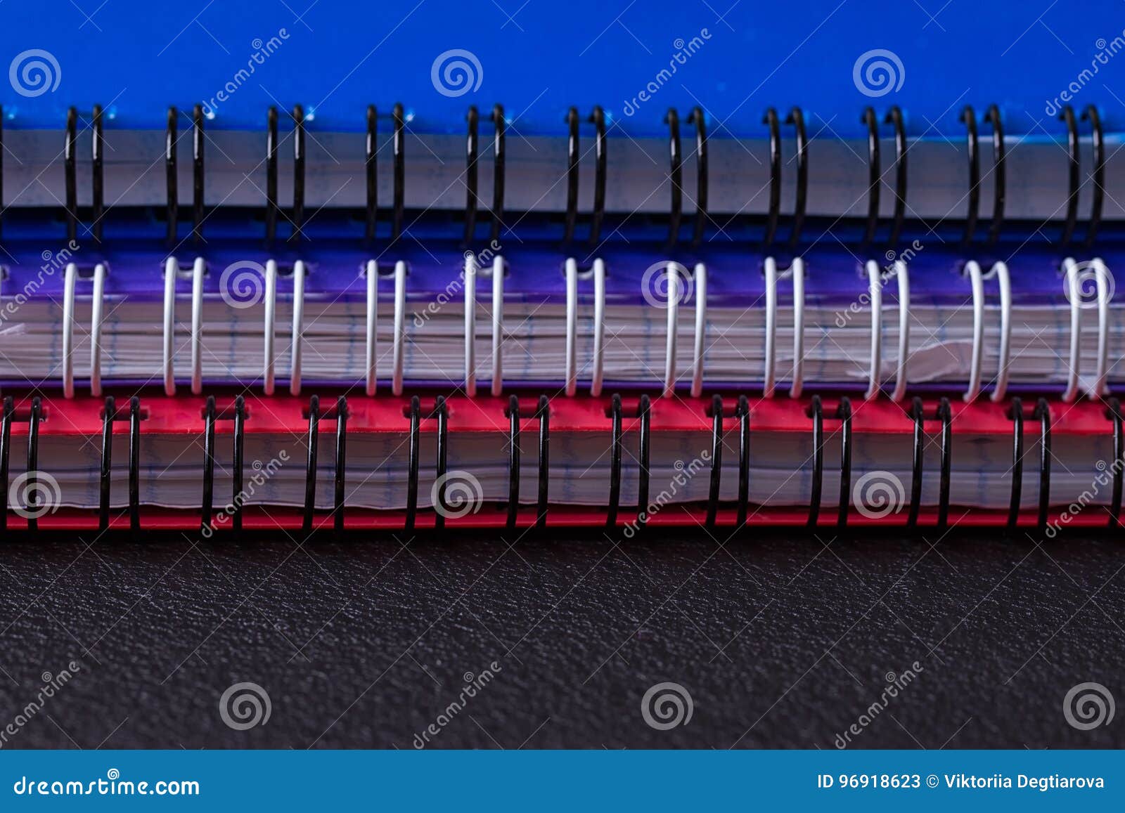 Several Multi-colored Notebooks on a Spiral Stock Image - Image of ...