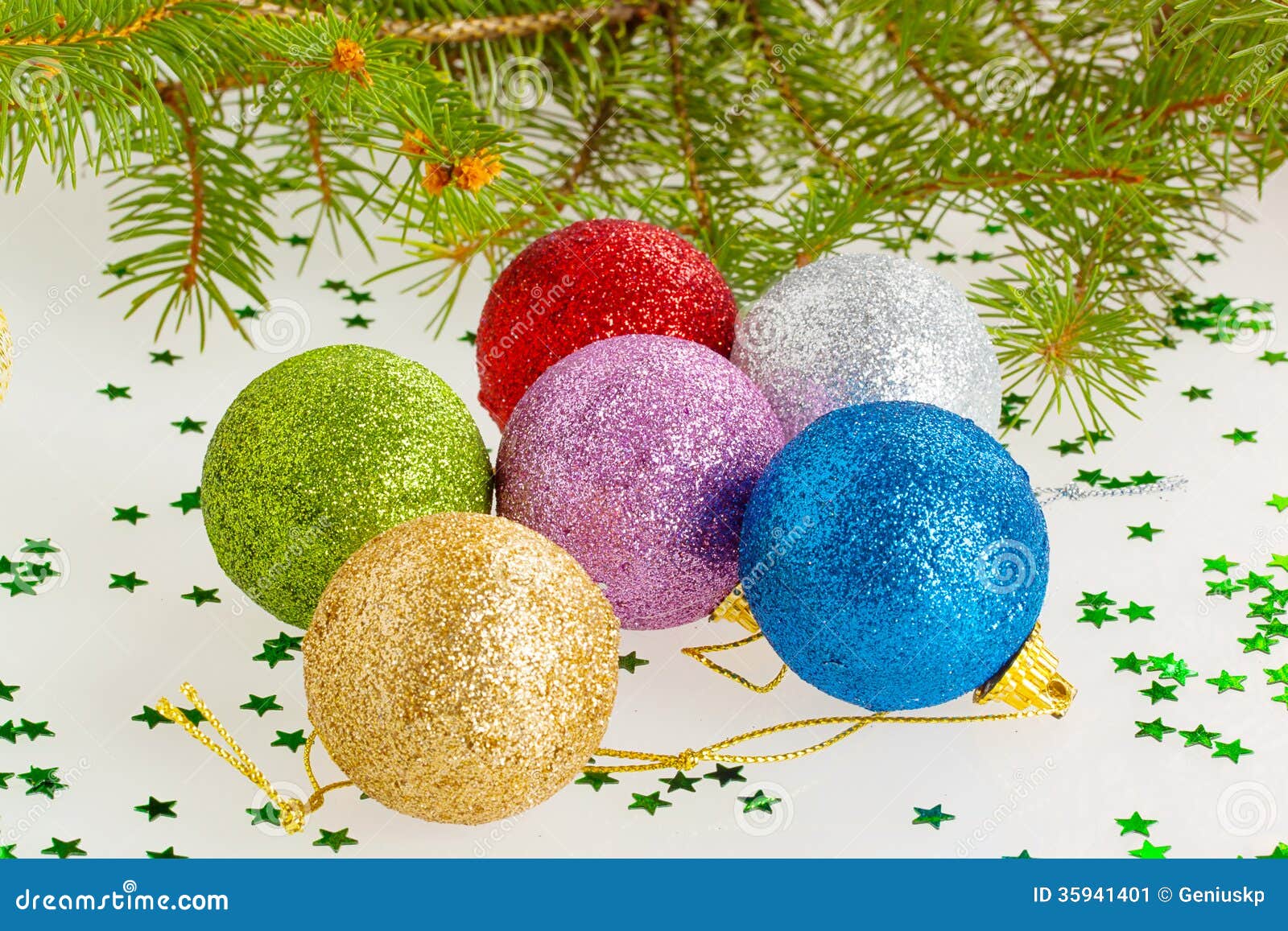 Several Multicolored Christmas Balls Under the Tree Stock Image - Image ...