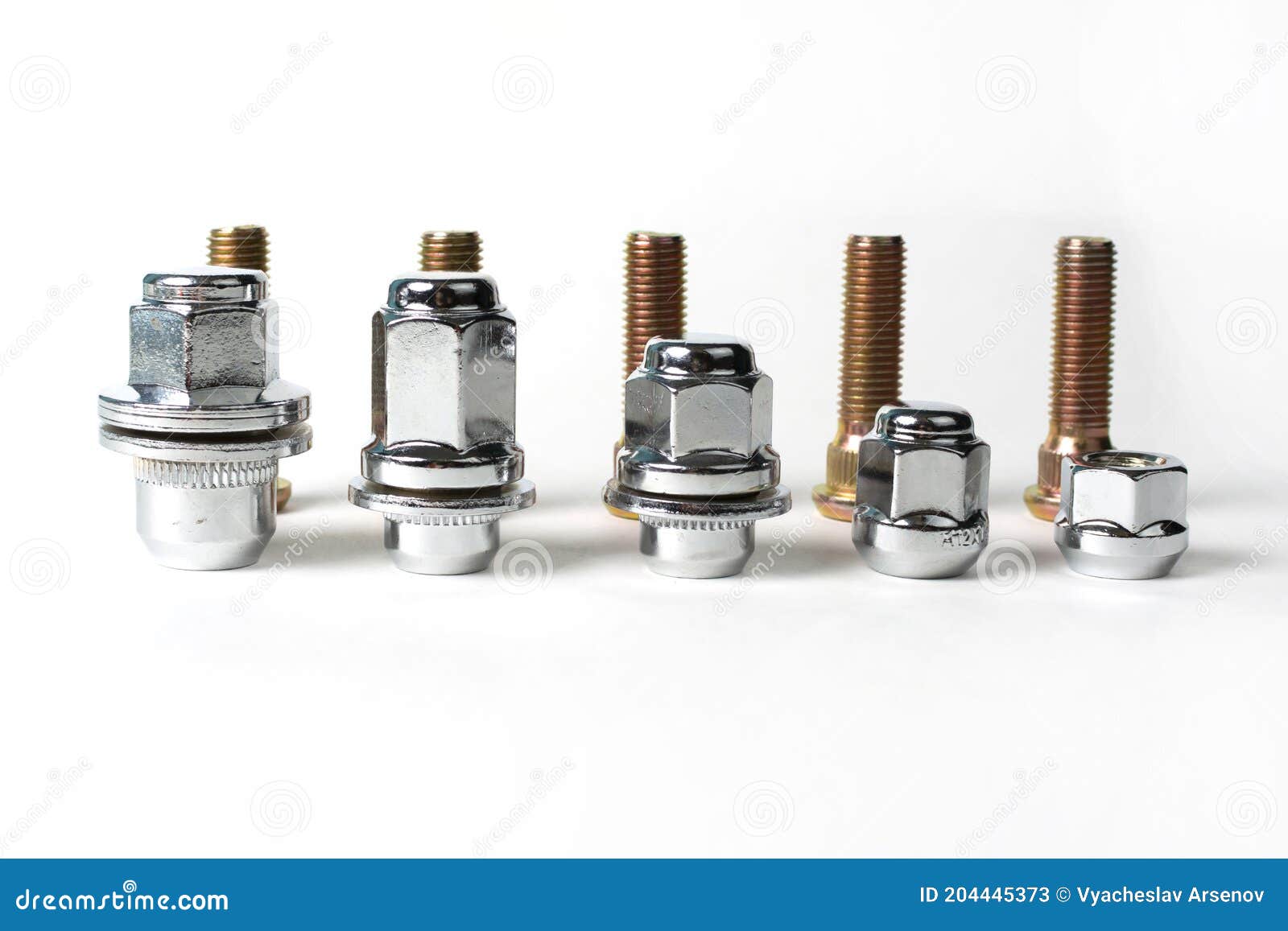 Several Nuts and Studs for Installing the Wheel on the Car Stock Image ...