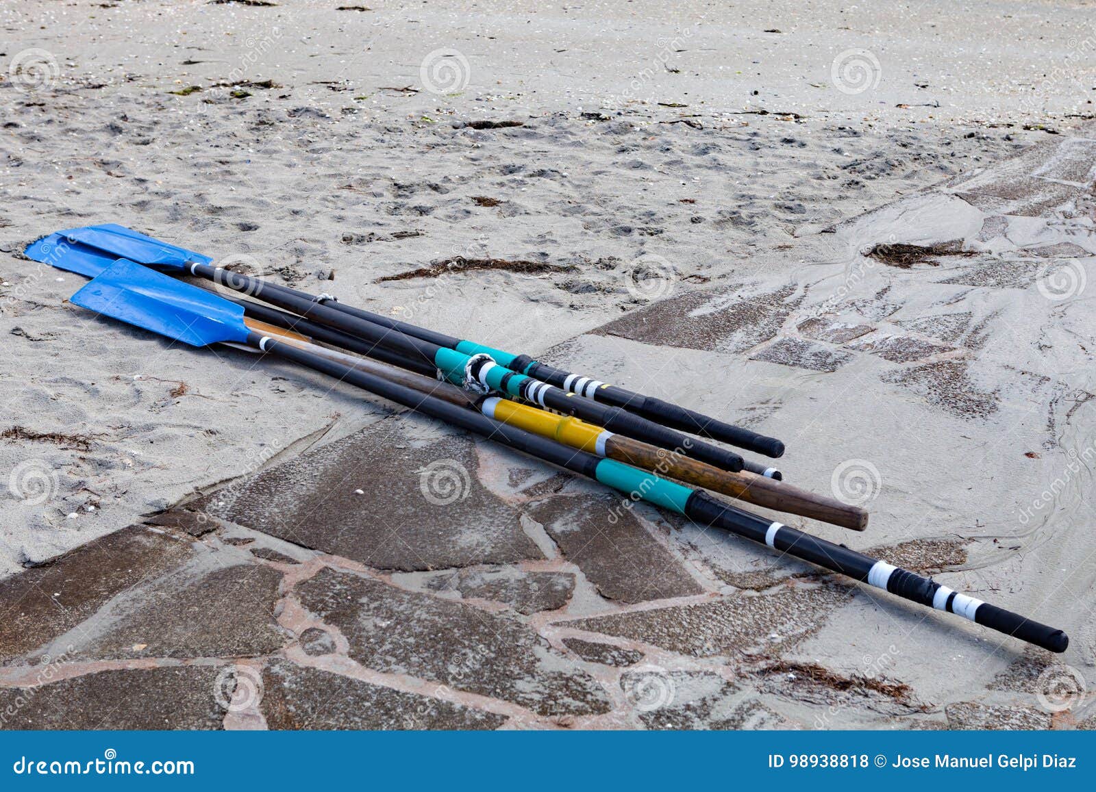 Several oars on the sand stock photo. Image of leisure - 98938818
