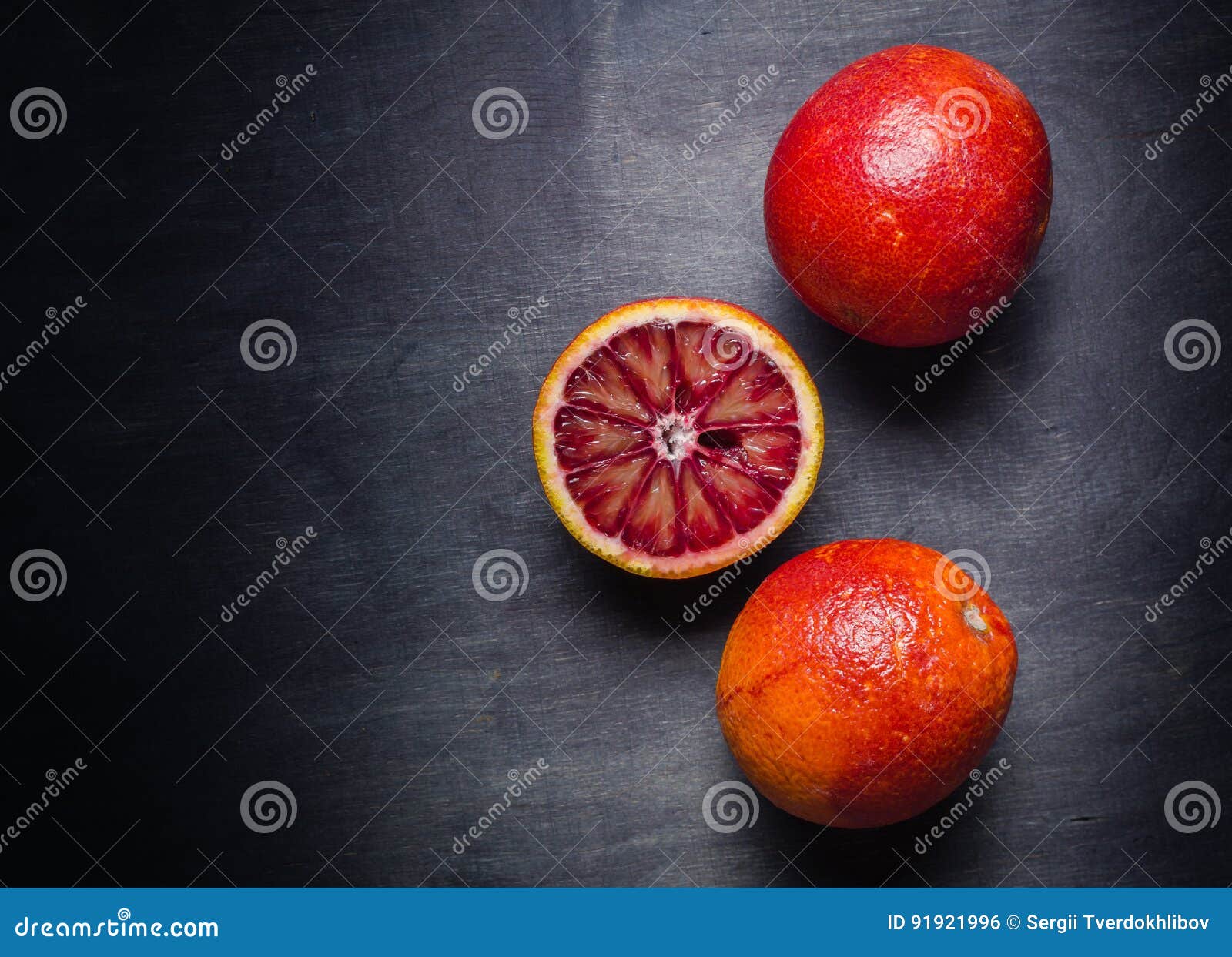 Several Oranges of Orange and Red on a Black Background. Minimalistic ...