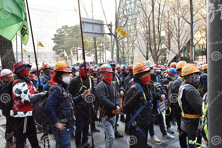 Several People are Protesting in Front of a City Building As ...
