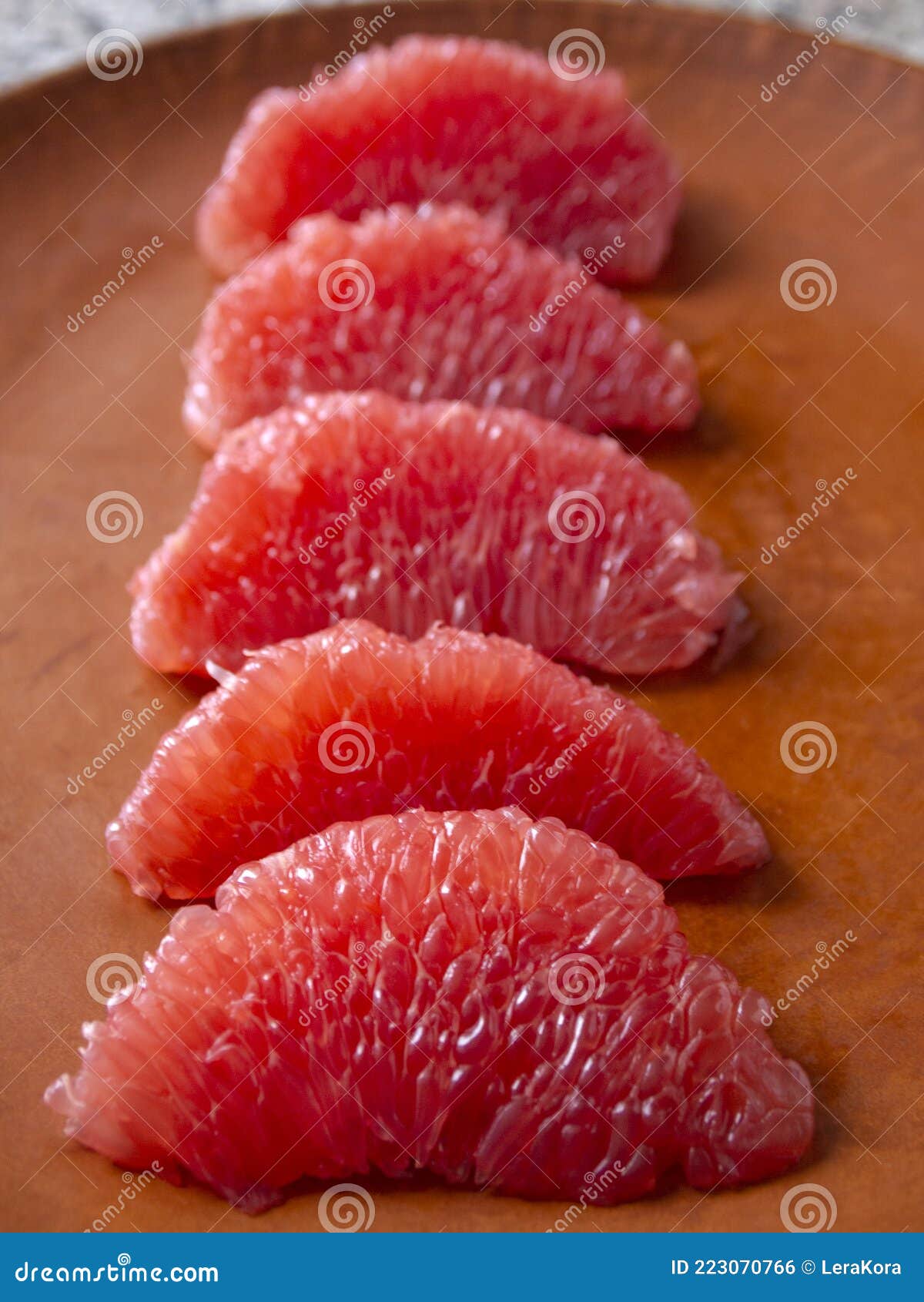 Several Pieces of Peeled Grapefruit are Laid Out in a Row Stock Photo ...
