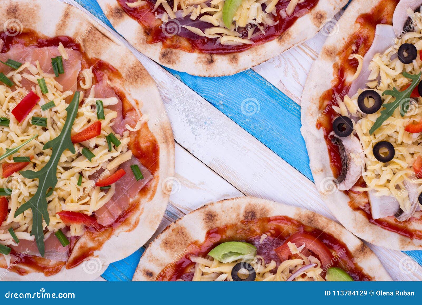 Several Pizzas on Striped Background Stock Image - Image of flour ...