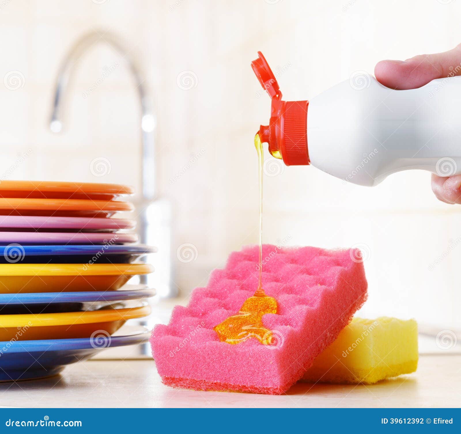 Several Plates and a Kitchen Sponge Stock Photo - Image of housework ...