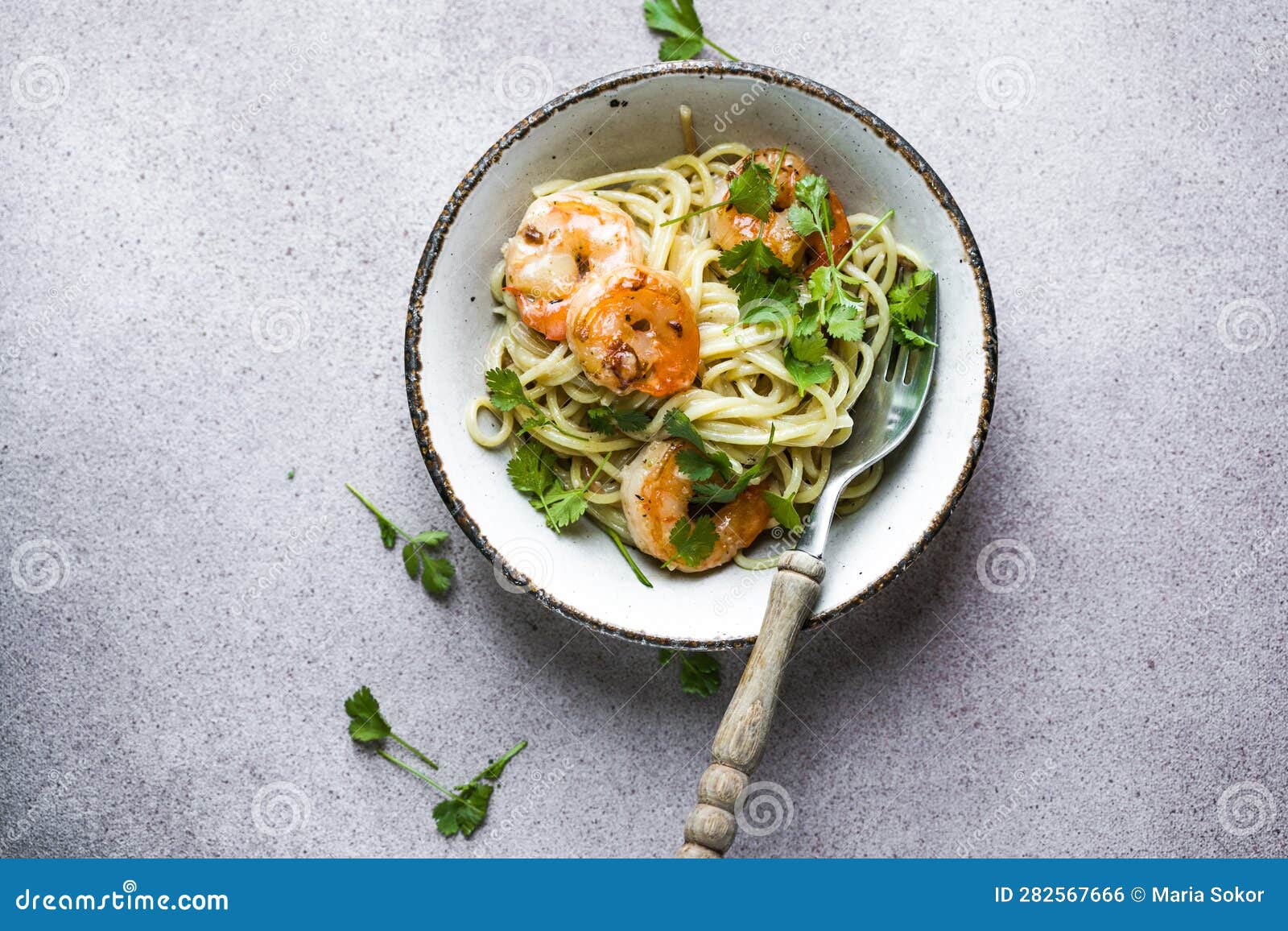 Several Portions of Cooked and Twisted Spaghetti Pasta with King Prawn ...