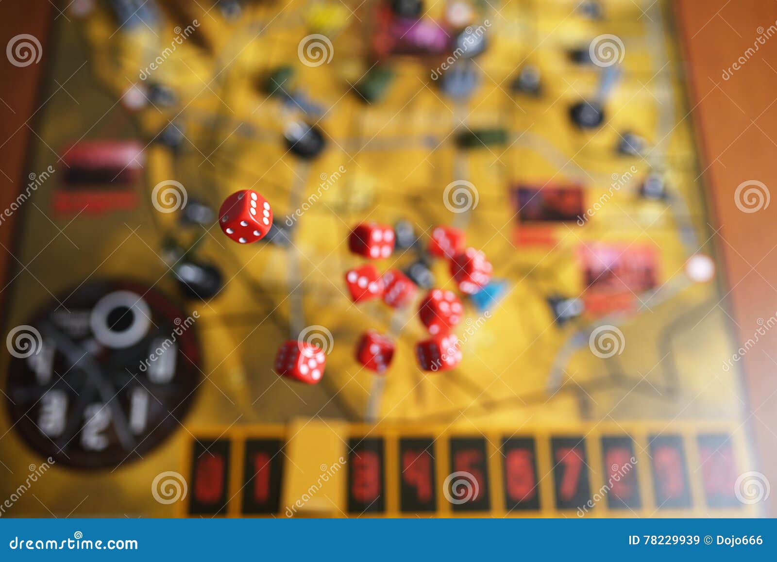 Several Rolling Red Dice Fall on a Table with Boardgame. Gameplay ...