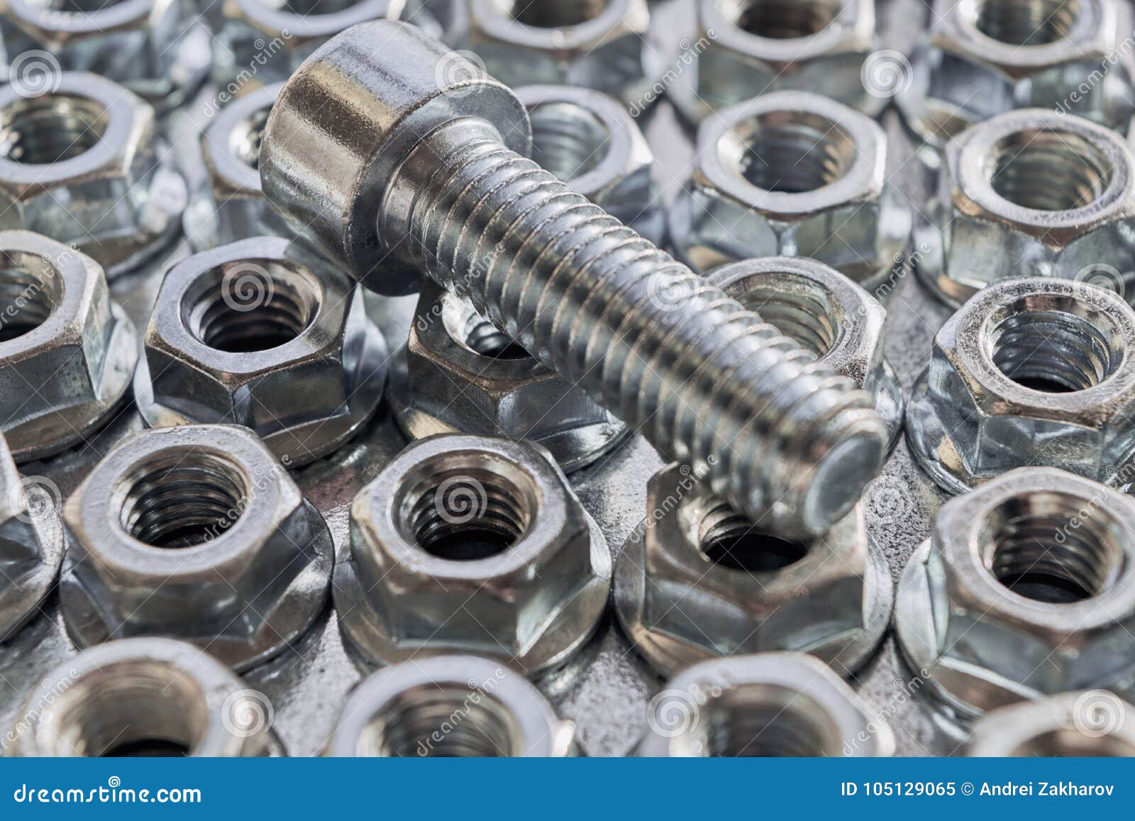 Several Rows of Hex Nuts Round Base and on Top is a Threaded Bolt ...