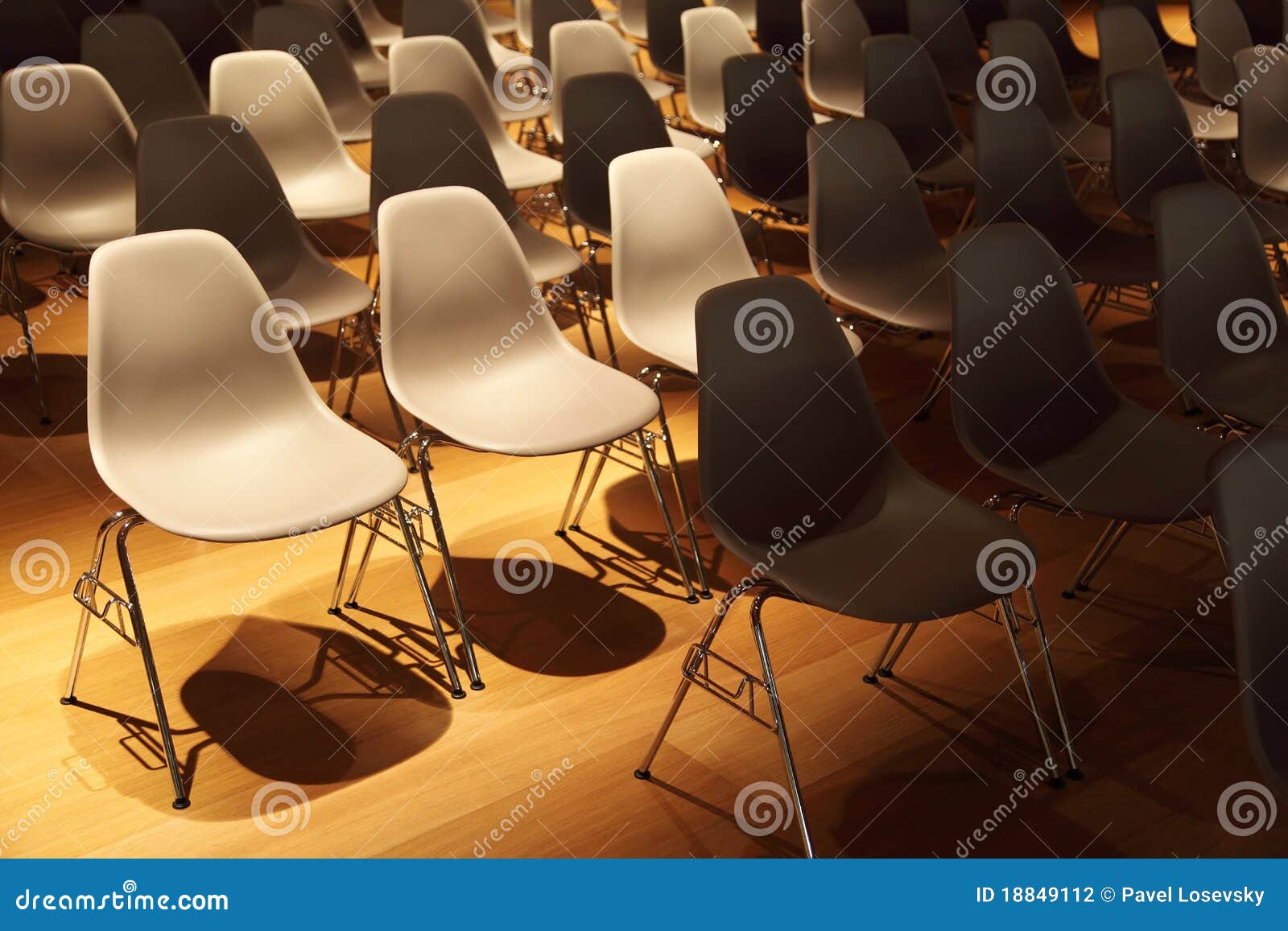 Several Rows of Plastic Chairs with Metal Legs Stock Photo - Image of ...