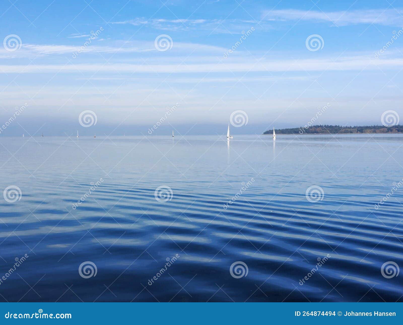 Several Sailing Ships in the Distance at the German Coast Stock Photo ...