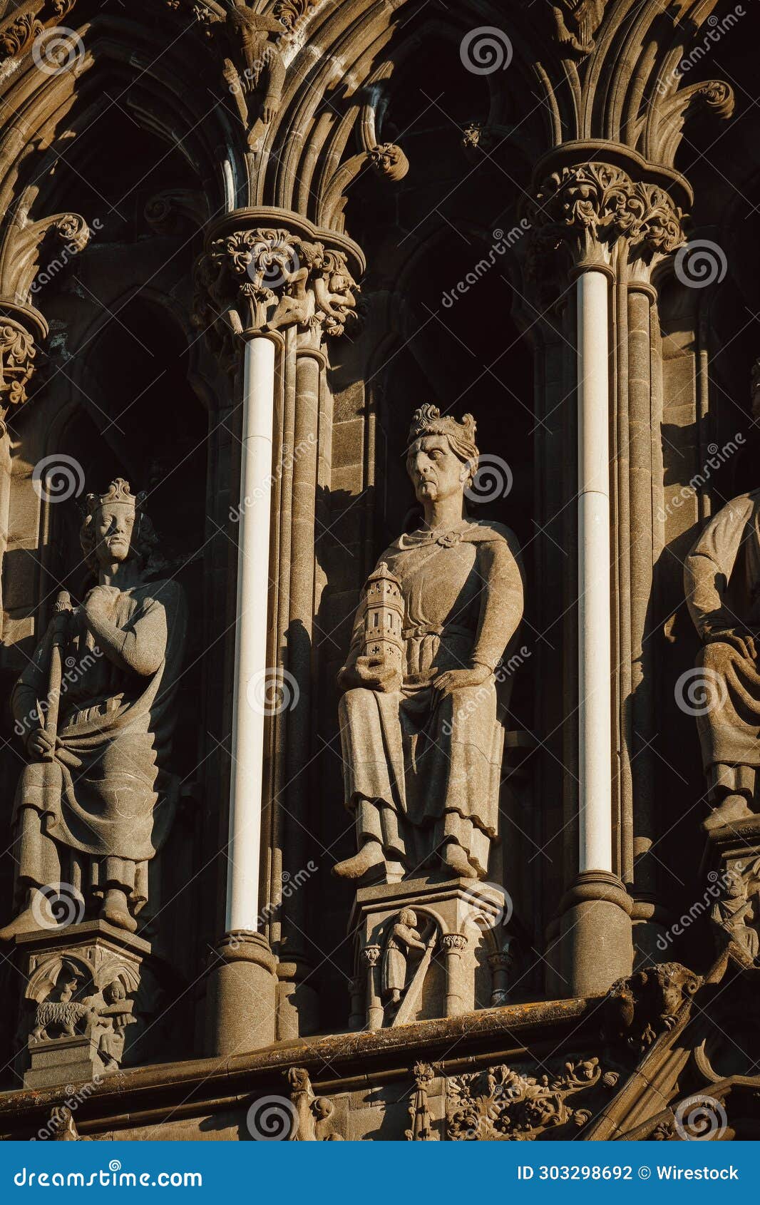 Several Sculptures on the Outside of a Large Building with Carved ...