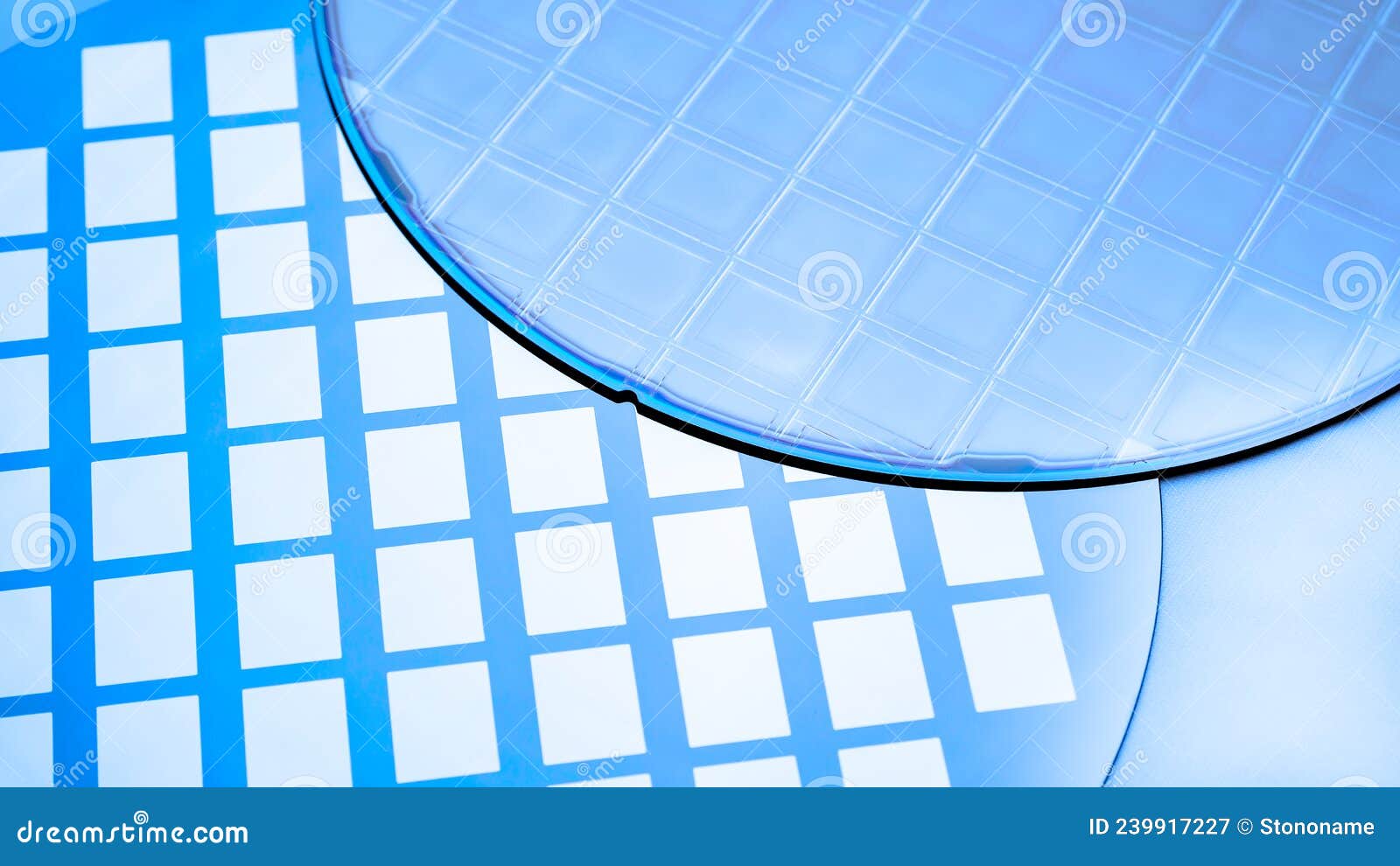 Several Silicon Wafers with Printed Circuits and Microchips.Blue Tone ...