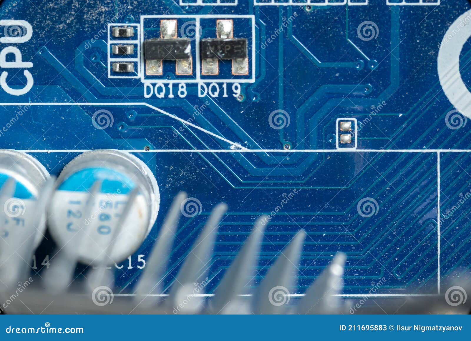 Several Small Microcircuits and Transistors on the Motherboard Next To ...