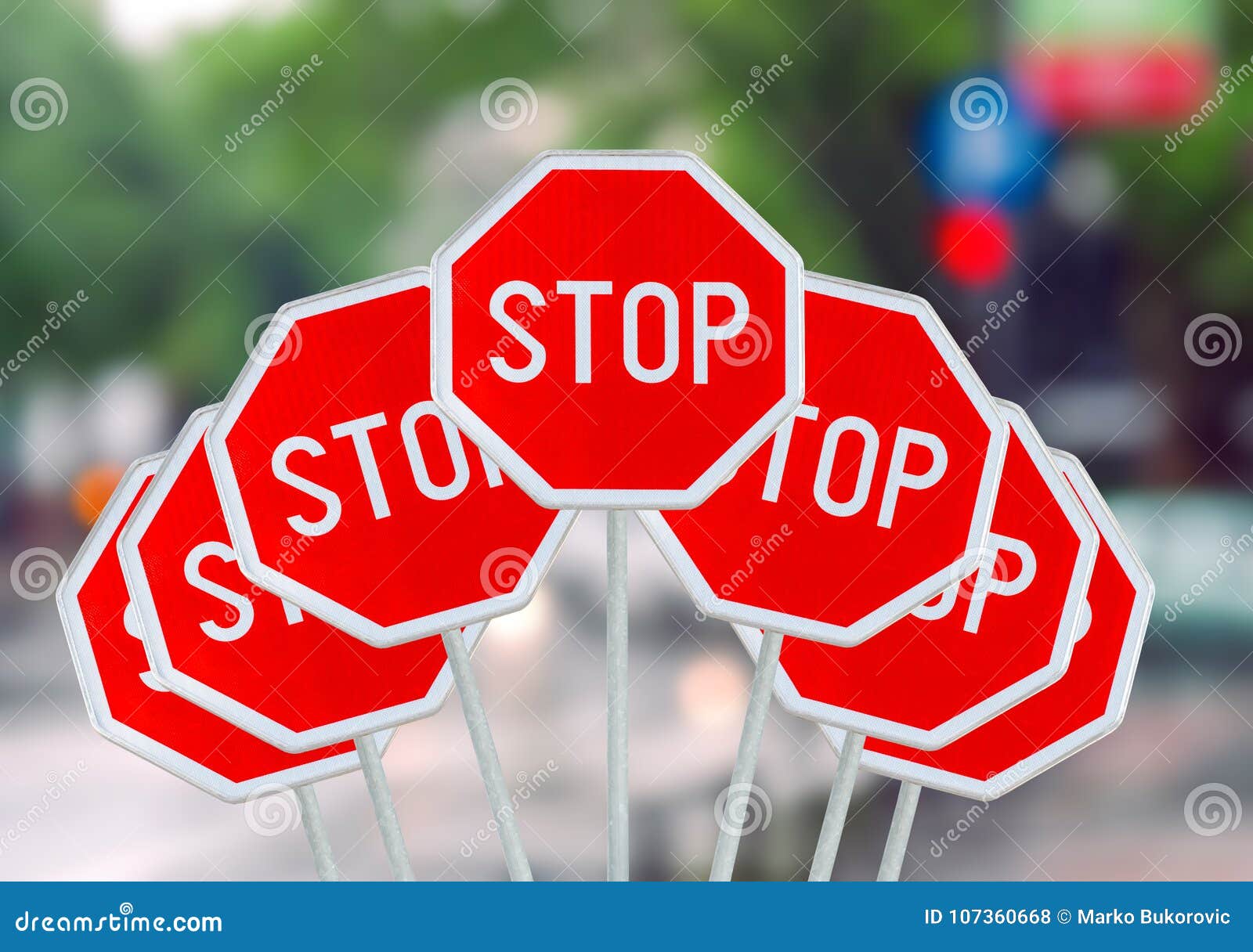 Several STOP Sign On Blurred City Road Stock Photo - Image of ...