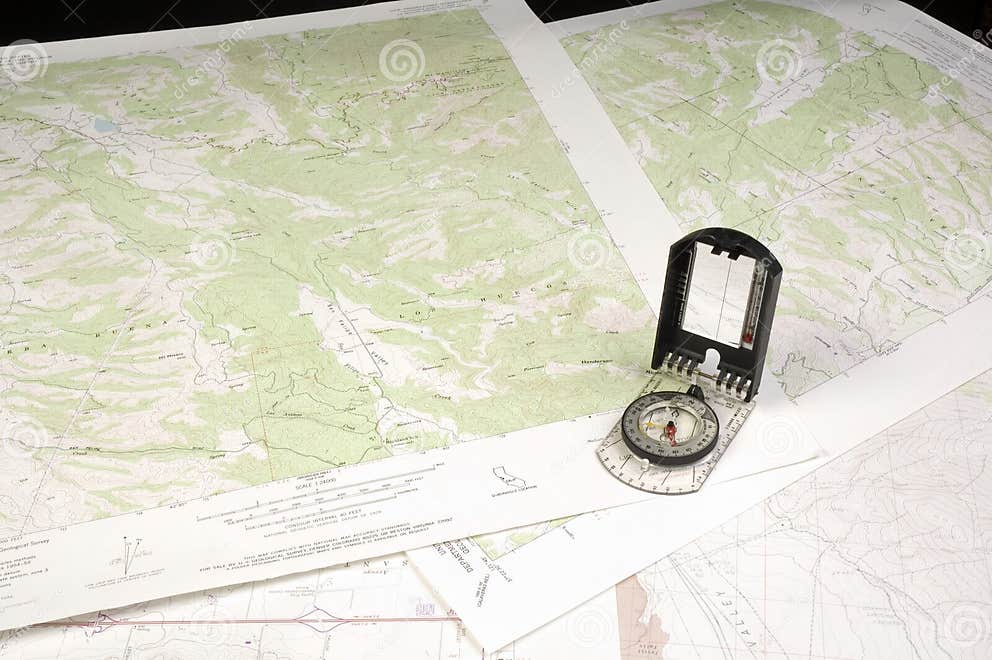 Several Topo Maps and Compass Stock Photo - Image of survival ...