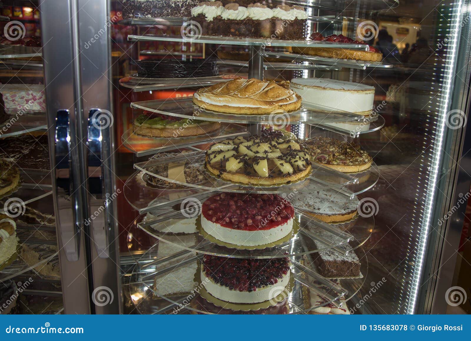 Several Types of Stuffed Cakes Inside a Pastry Display Stand Stock ...