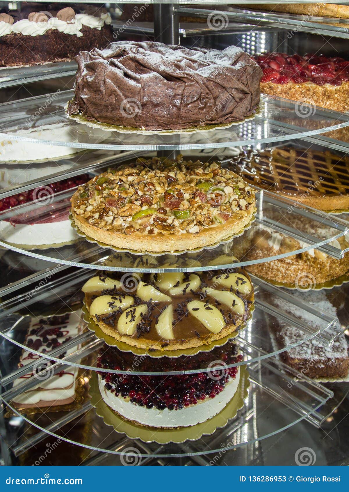 Several Types of Stuffed Cakes Inside a Pastry Display Stand Stock ...