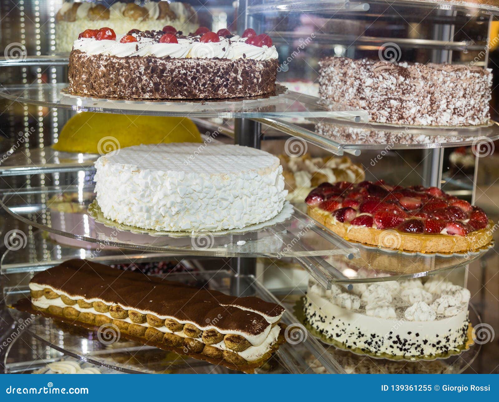 Several Types of Stuffed Cakes Inside a Pastry Display Stand Stock ...