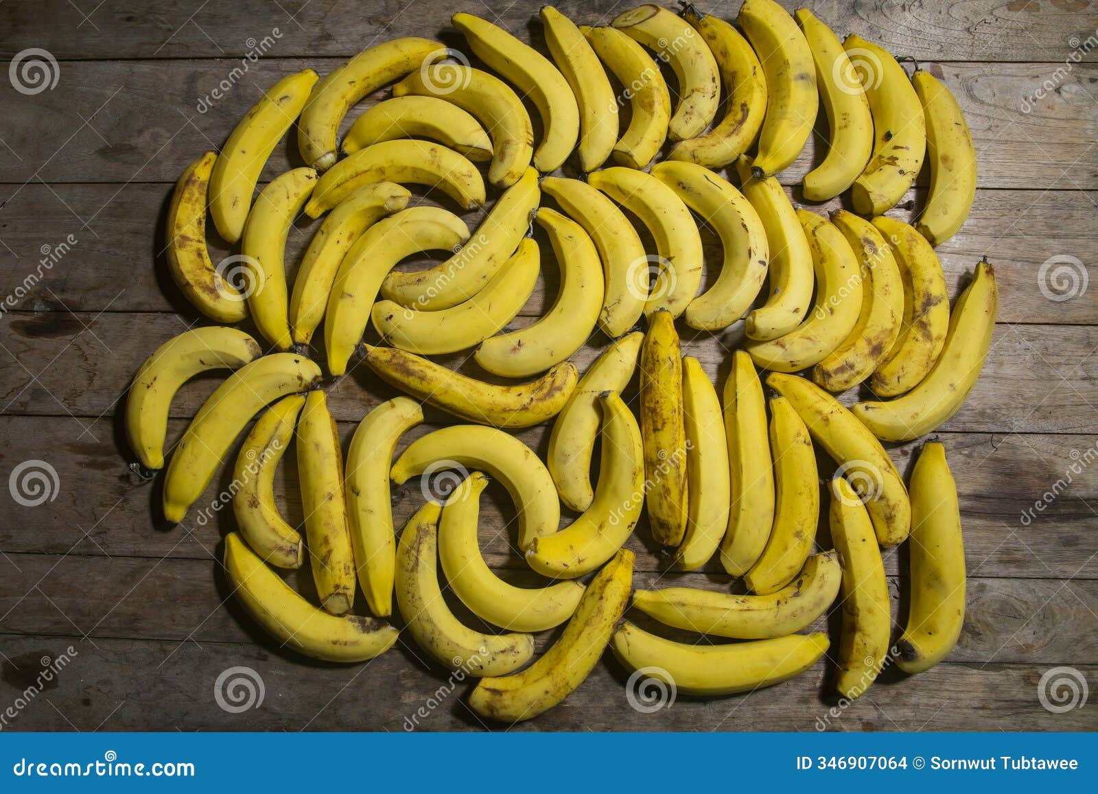 Several Ugly Bananas Lay Empty on an Old Wooden Table Stock Photo ...
