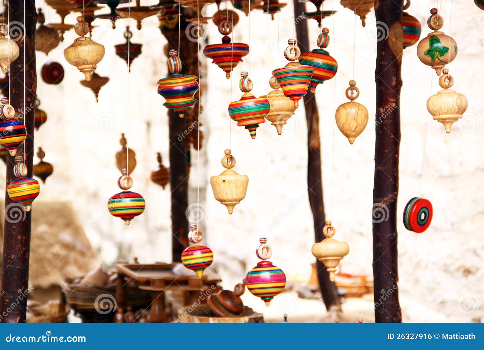 Several Wooden Spinning Tops Stock Photo - Image of blue, color: 26327916