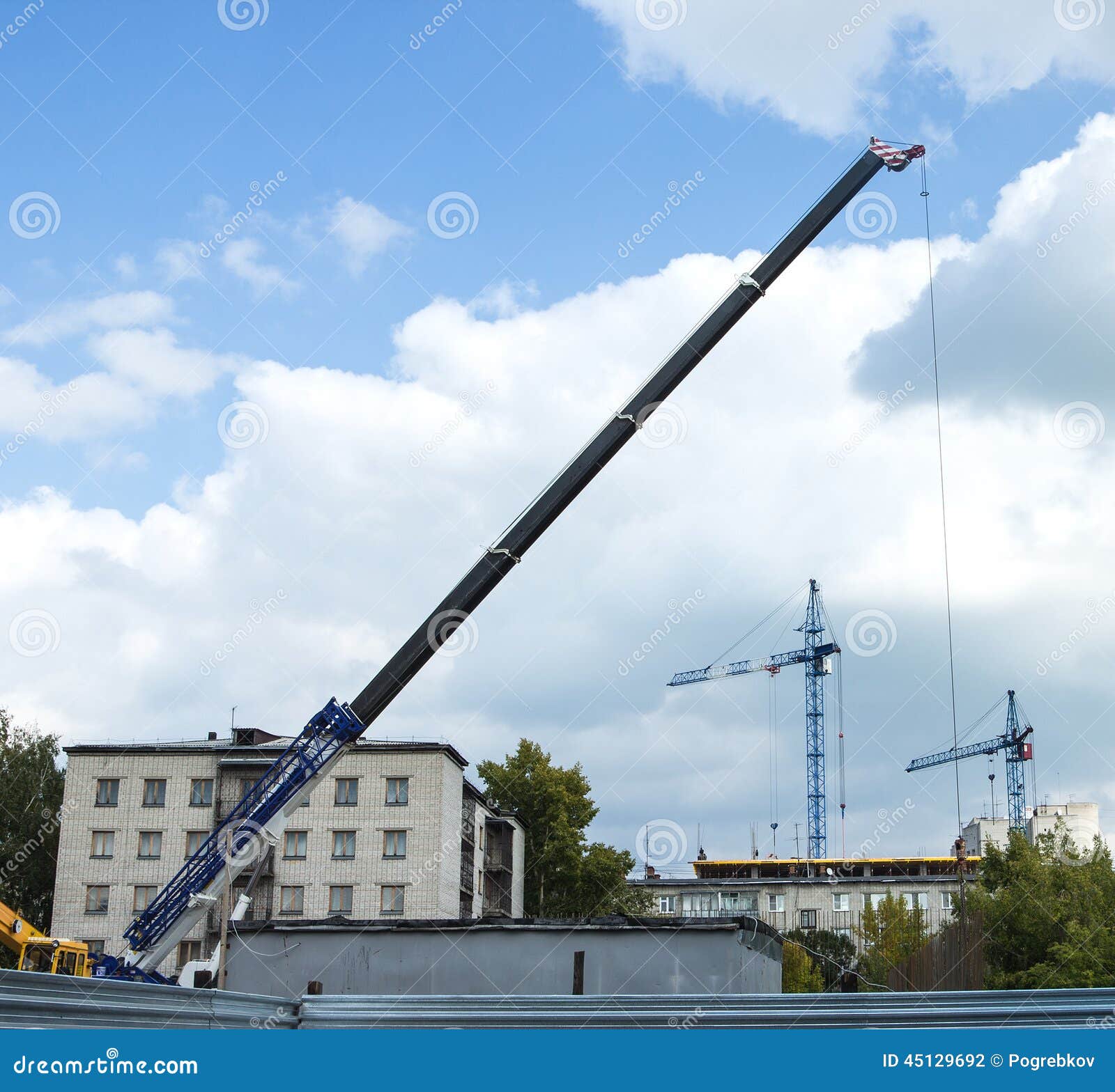 Several working cranes stock photo. Image of constructing - 45129692