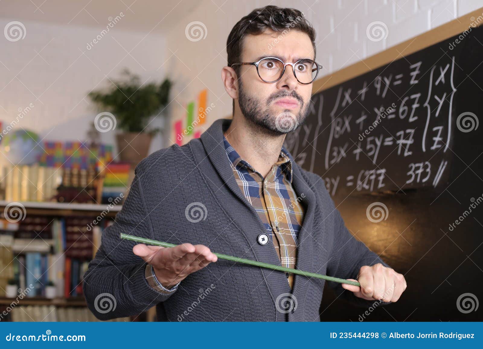Severe School Teacher Holding Stick Stock Photo - Image of chalk, male ...