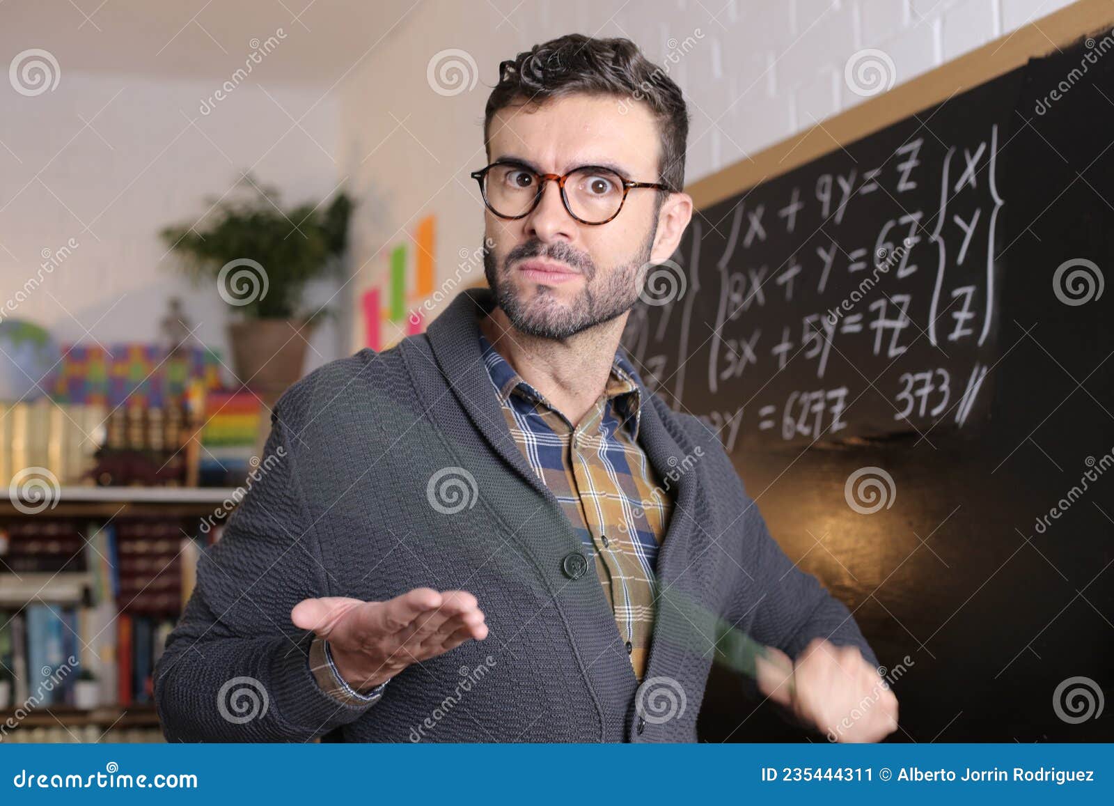 Severe School Teacher Holding Stick Stock Image - Image of bossy, male ...