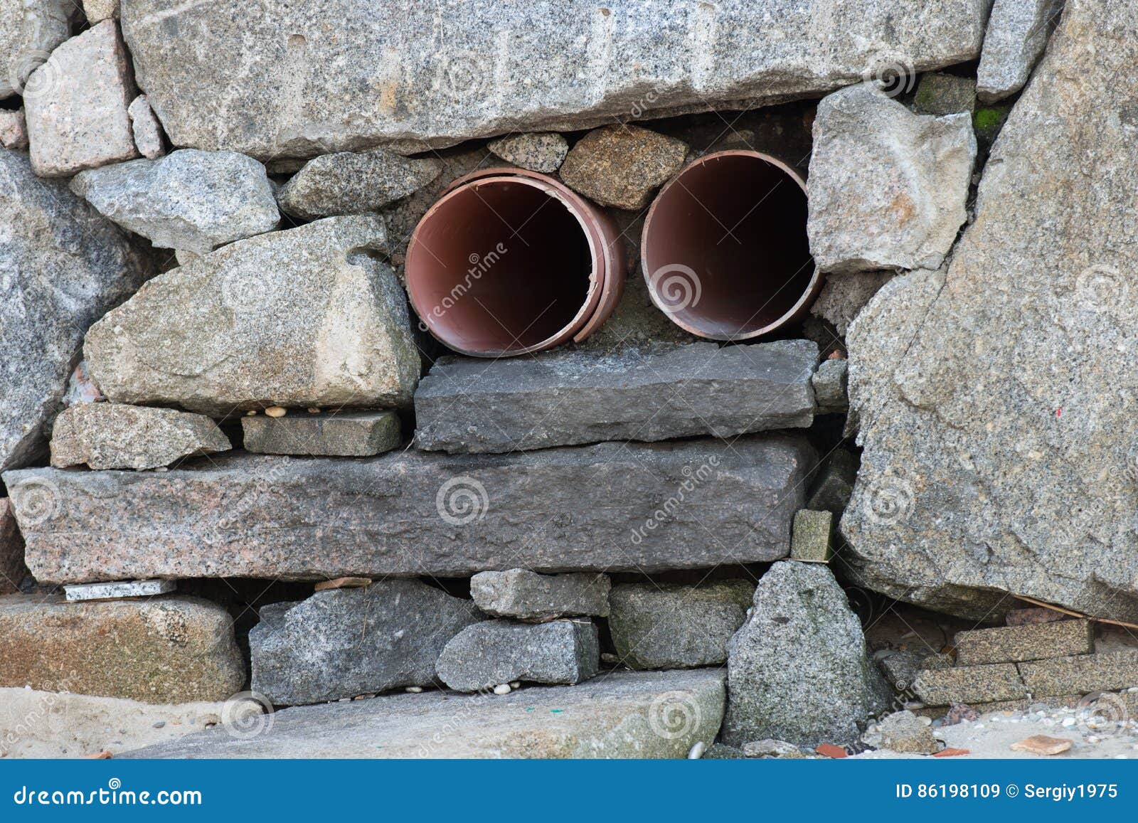 Sewage Pipe in the Stone Wall Stock Image - Image of brown, drainage ...