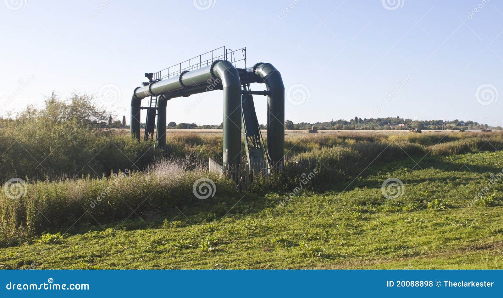 Sewage pipes over a river stock photo. Image of chemical - 20088898